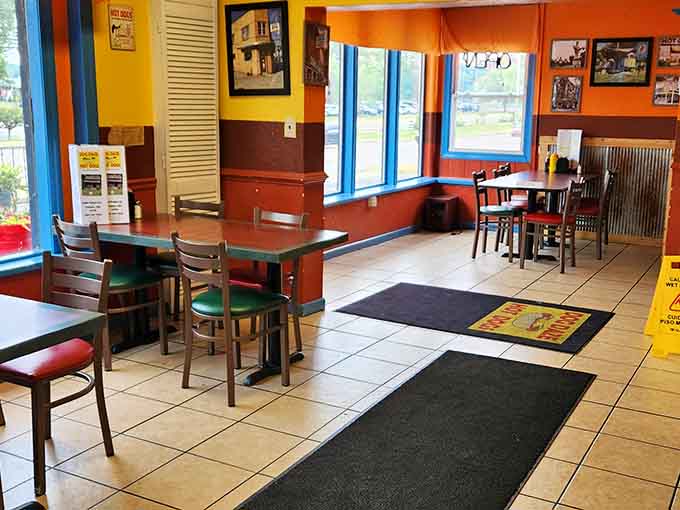 Bright walls and cozy seating create the perfect casual atmosphere where hot dogs are taken seriously but pretension isn't invited.