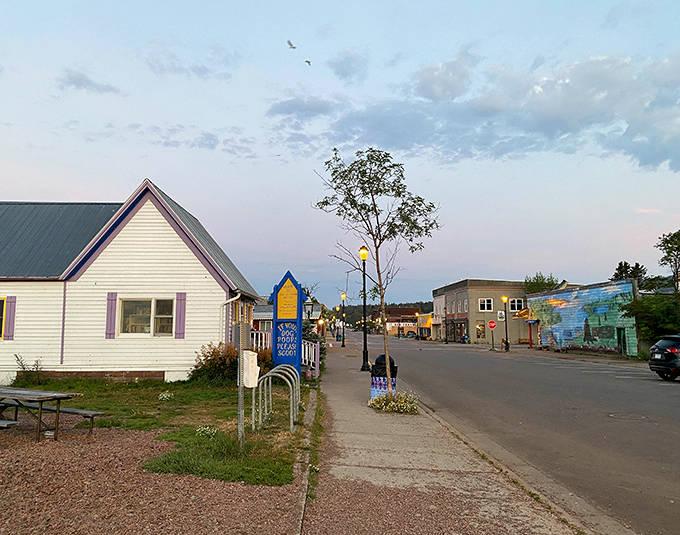 Downtown Grand Marais transforms into a magical scene at dusk, with twinkling lights guiding visitors along streets filled with local treasures.