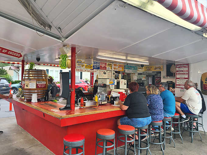 Pull up a stool at the classic red counter where friendly faces and sizzling grills have been serving up nostalgia since before your grandparents' first date.