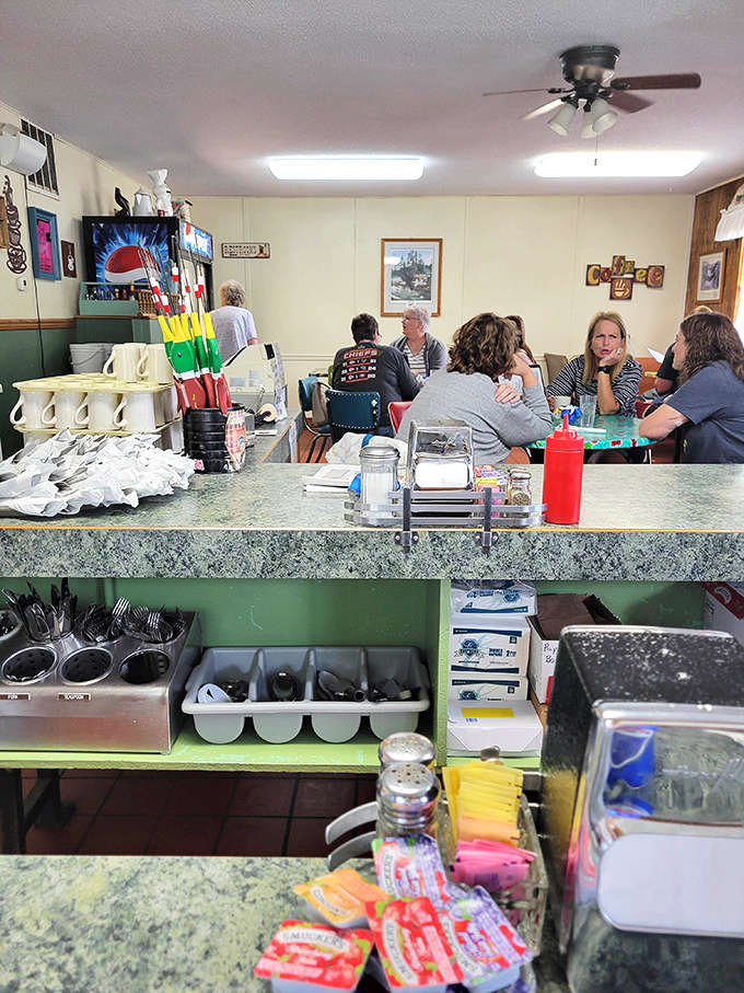 Inside, time seems to slow down as locals gather at tables, sharing stories over steaming mugs of coffee in this unpretentious haven.