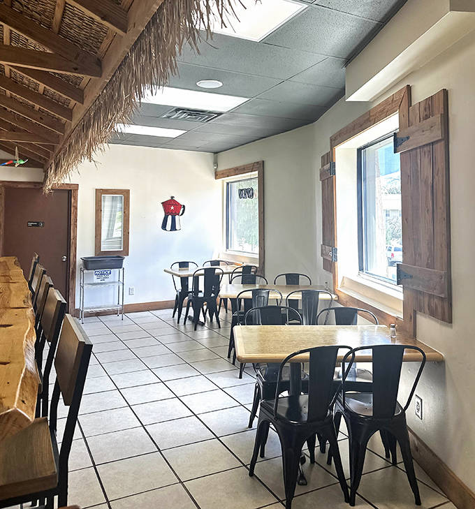 Rustic wooden walls and thatched palm accents transport diners from the Midwest to a cozy Havana caf&eacute;.