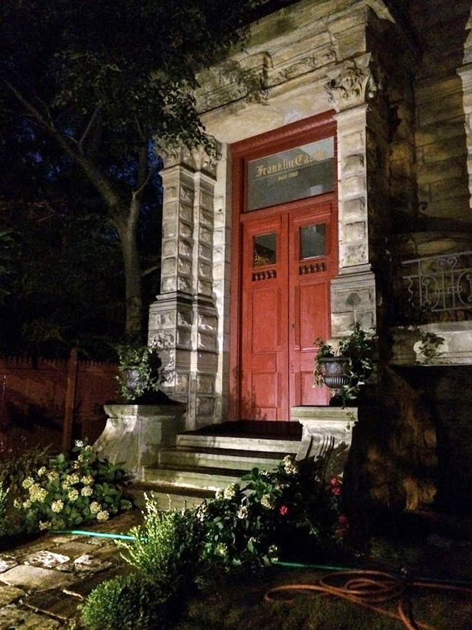 Those double doors have welcomed guests for over a century, though some visitors report the house itself decides who really gets invited in.