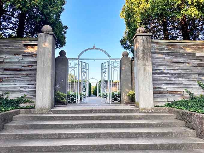 Formal gardens entrance: These elegant gates aren't just an entrance&mdash;they're a promise. "Ordinary world, stay behind; wonderland, we're coming in!"