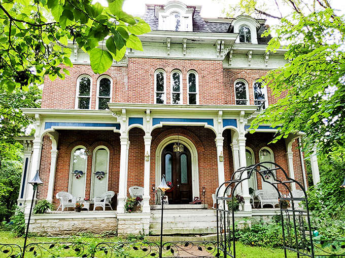 Three floors of bookish bliss await behind this unassuming storefront, where the green awning signals "slow down, reader ahead."