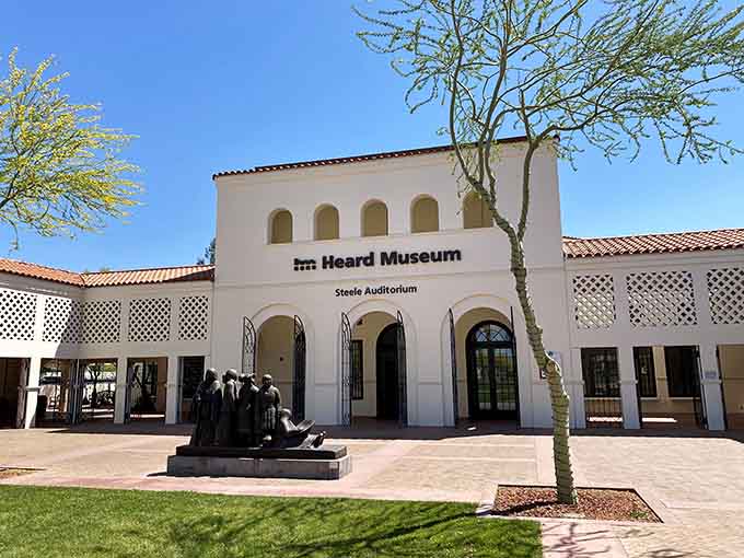 Those graceful arches and pristine white walls create an atmosphere that whispers "something special awaits inside" before you've taken a single step.