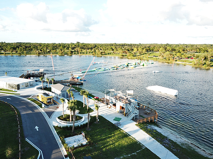 Bird's eye bliss: From above, Shark Wake Park resembles a water-lover's dream circuit, with pathways of floating fun stretching across the sparkling lake.