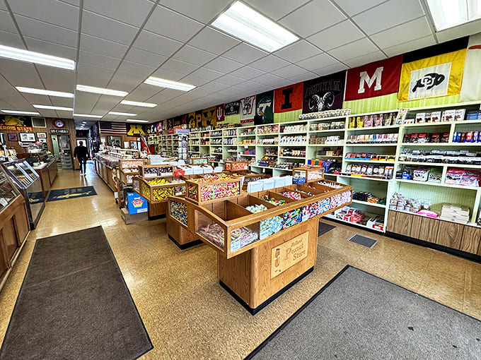 Candy paradise stretches before you &ndash; rows of wooden display cases filled with handcrafted treats under the watchful gaze of college pennants.