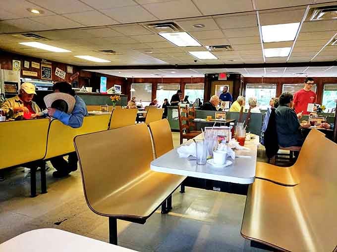 Step inside and time rewinds &ndash; yellow booths and wood paneling create the authentic diner atmosphere that chain restaurants try desperately to imitate.