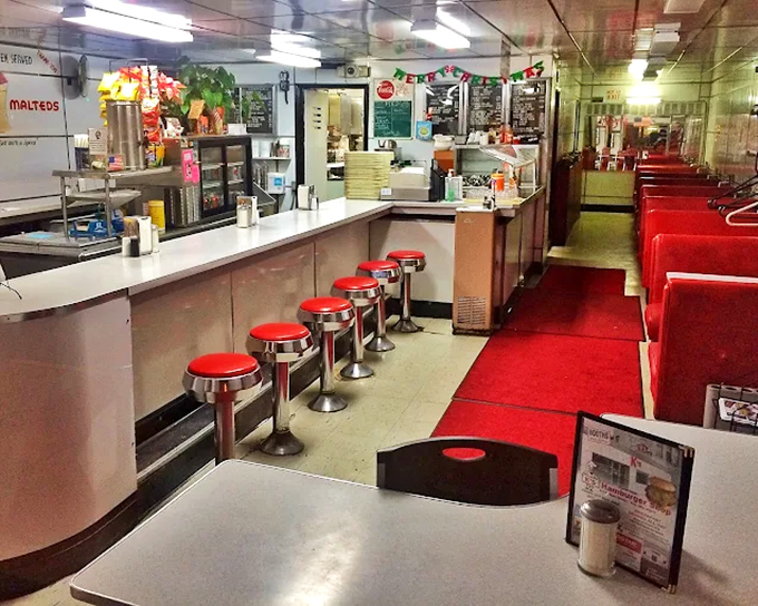 Inside: Red vinyl stools and a gleaming counter where strangers become friends over coffee &ndash; this isn't manufactured nostalgia, it's the genuine article preserved through decades.