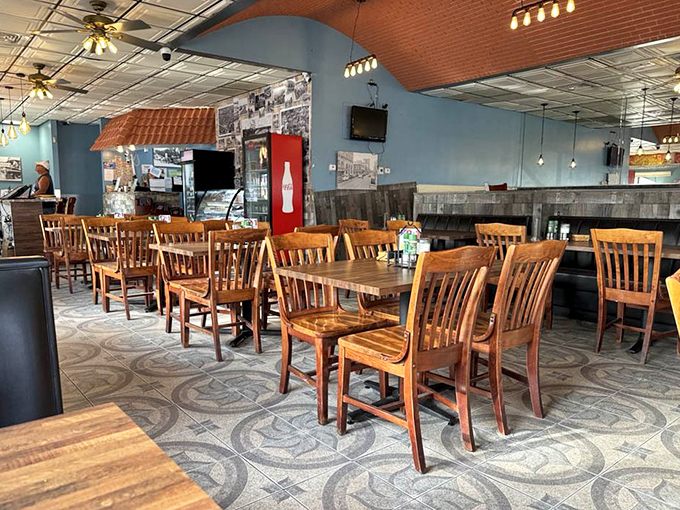 Wooden chairs and blue walls create that perfect neighborhood vibe – casual enough for breakfast, inviting enough for dinner.