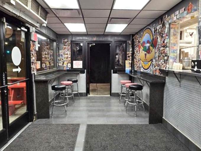 Inside The Wiener's Circle, where decades of Chicago history line the walls and the compact counter space buzzes with energy and anticipation.
