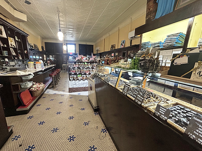 Step into this narrow time capsule where the original tile floor and wooden fixtures have witnessed over a century of sweet memories and first dates.