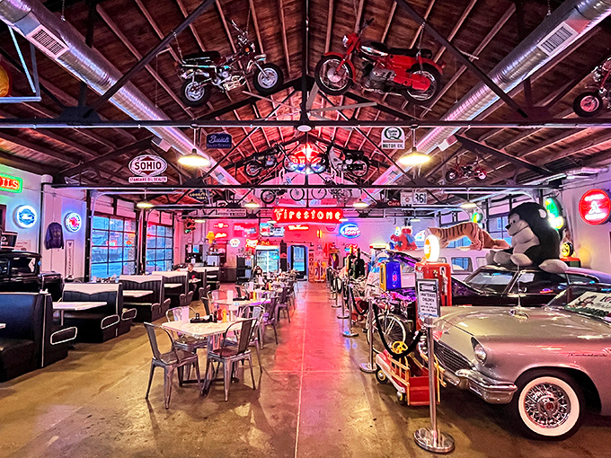 Motorcycles suspended from wooden rafters and classic cars parked tableside – dining here is like eating inside the world's coolest garage sale.