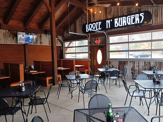 Interior: Rustic charm meets casual comfort in Whitey's dining area, where corrugated metal walls and wooden beams create the perfect backdrop for memorable meals.