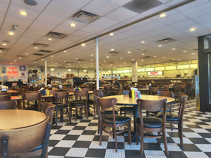 Classic checkered floors and wooden chairs create the perfect backdrop for serious eating &ndash; no fancy frills, just focus on the food.