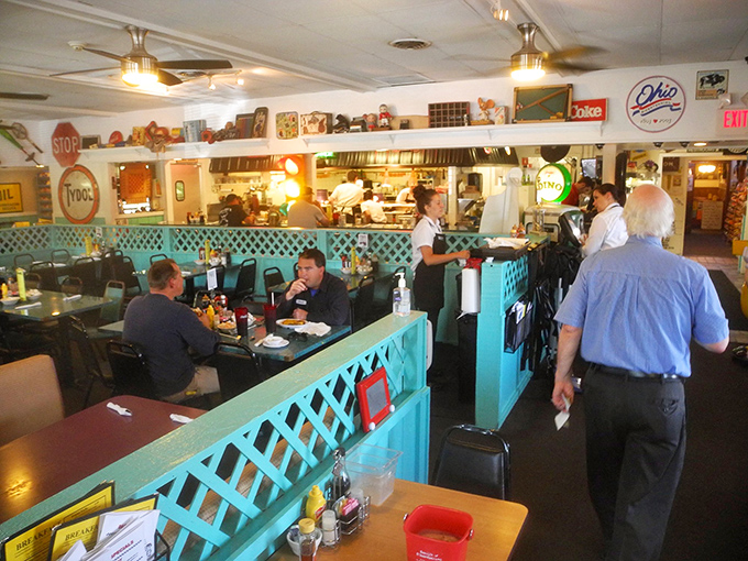 Step into a time machine disguised as a restaurant, where turquoise booths and vintage treasures create pure nostalgic magic.