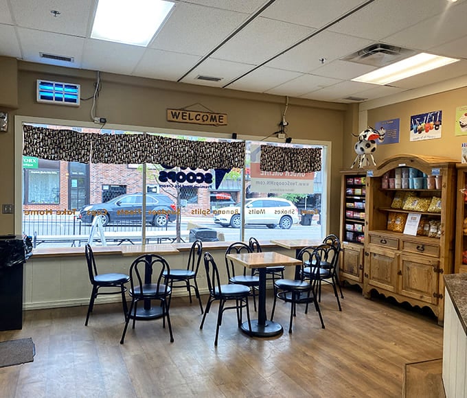 Inside Two Scoops, simple wooden tables and chairs invite you to sit and contemplate life's greatest question: one scoop or two?