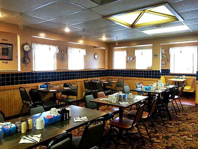 Wood-paneled walls and cozy booths create that perfect small-town caf&eacute; atmosphere where conversations flow as freely as the coffee.