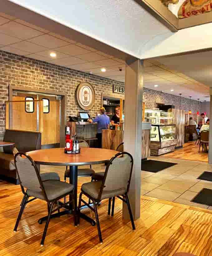 Warm wooden floors and exposed brick create that "where everybody knows your name" vibe that chain restaurants spend millions trying to fake.