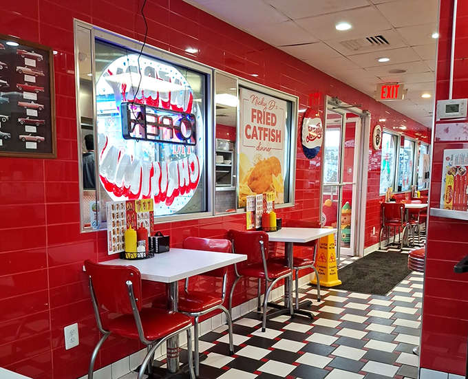 Red tiles, checkered floors, and counter seating &ndash; this interior isn't trying to be trendy, it's aiming for timeless. Mission accomplished!