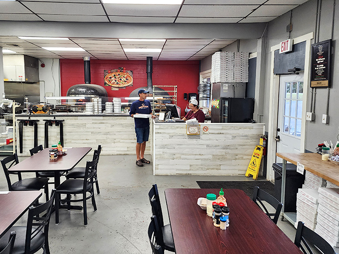 Simple, no-frills dining space where the focus stays where it belongs &ndash; on the incredible food coming from that wood-fired oven.