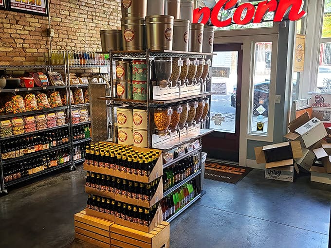 Exposed brick meets modern snacking in this cozy interior where popcorn dreams come true and dietary restraint goes to die a delicious death.