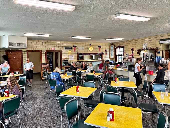 Step inside and suddenly you're in 1955 – yellow formica tables, chrome chairs, and conversations that happen face-to-face instead of through screens.