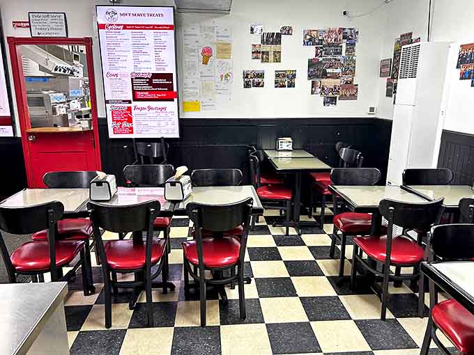 Classic checkerboard floors and red vinyl seats transport diners back to simpler times, when ice cream parlors were community gathering spots.