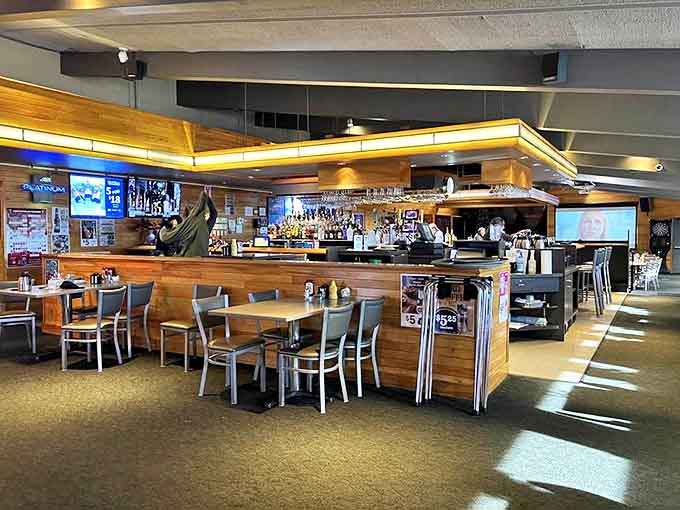 Warm wood paneling and comfortable seating create the perfect atmosphere for enjoying comfort food classics while watching the world go by.