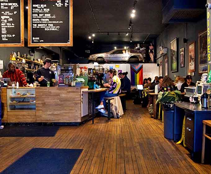 Inside, the caf&eacute; buzzes with energy as patrons enjoy exceptional coffee amid a treasure trove of '80s memorabilia and vintage furniture.