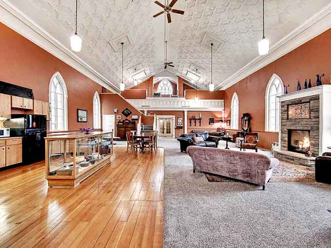 The former sanctuary now sanctifies relaxation with soaring ceilings and warm wood tones that whisper "kick off your shoes."