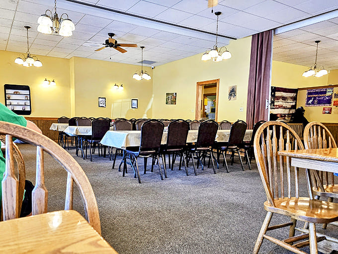 Simple wooden chairs and clean tablecloths create an atmosphere of unpretentious comfort, like dining in a beloved relative's country home.