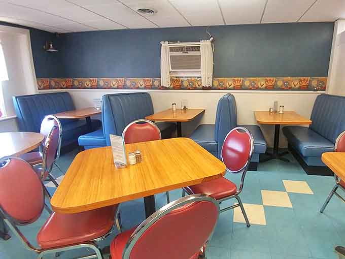 Inside, blue booths and wooden tables create that "grandma's dining room" feel where comfort trumps pretension every time.