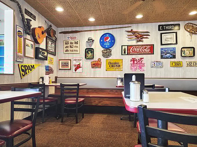 Vintage signs and memorabilia transform ordinary walls into a time capsule &ndash; each artifact telling stories of America's golden diner era.