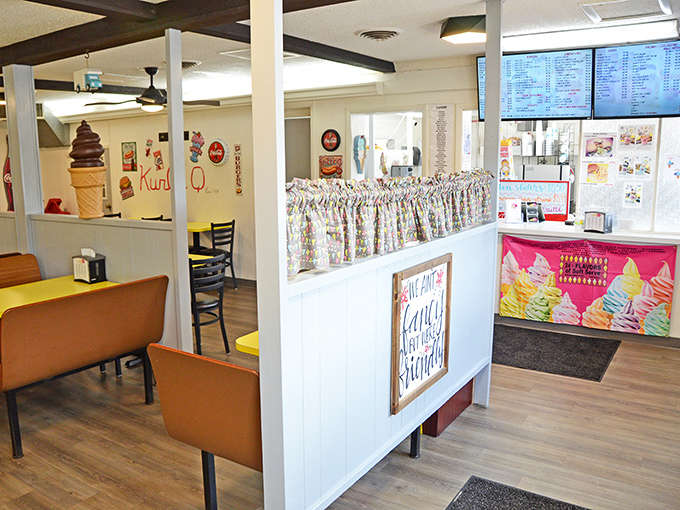Step inside and the retro charm hits you immediately, bright yellow tables and vintage decor creating the perfect backdrop for ice cream memories.