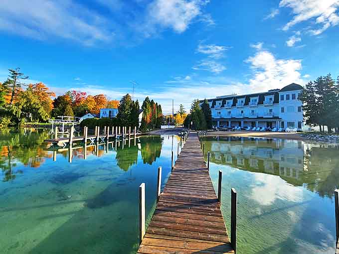 This wooden dock stretches toward possibilities, where morning coffee tastes better and life's problems seem smaller with every step.