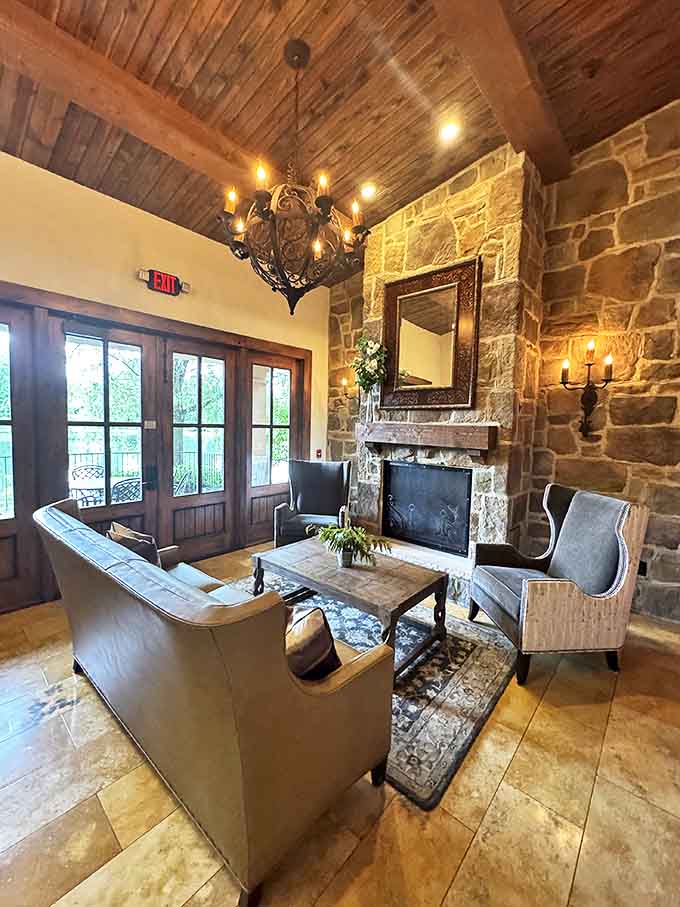 A cozy living area where rustic stone meets elegant comfort &ndash; the perfect spot to contemplate whether it's socially acceptable to move in permanently.