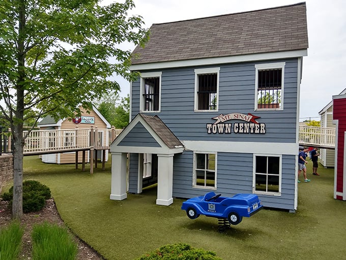 The Town Center stands proud with its blue siding and welcoming porch &ndash; headquarters for pint-sized mayors and community planners.