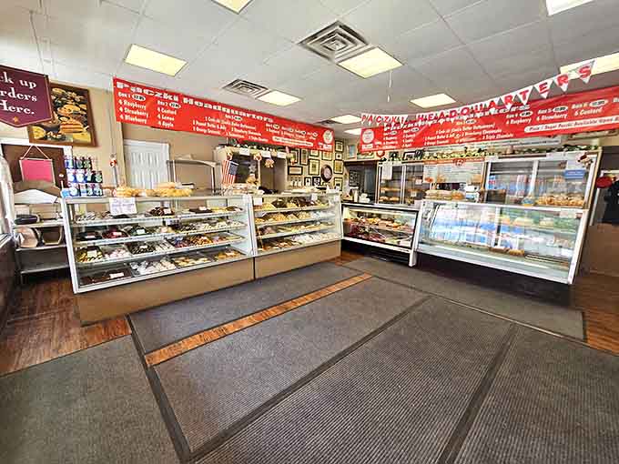 Inside, time stands still as glass cases showcase decades of tradition, while the menu board promises delights that most spell-check programs would flag.
