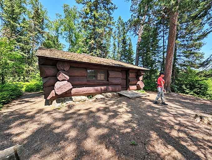 The historic Old Timer's Cabin stands as a rustic time capsule, its hand-hewn logs telling stories of craftsmanship from a bygone era.