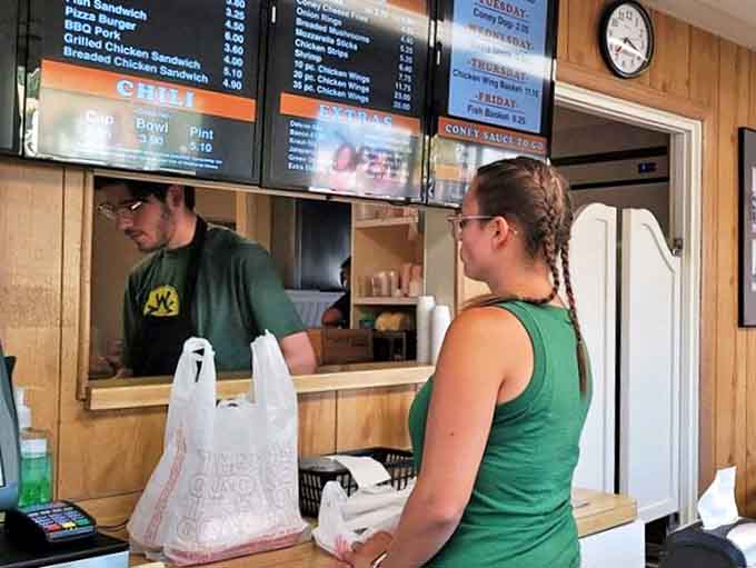 At the order counter, friendly staff continue a tradition of service that makes every customer feel like a regular, even on their first visit.