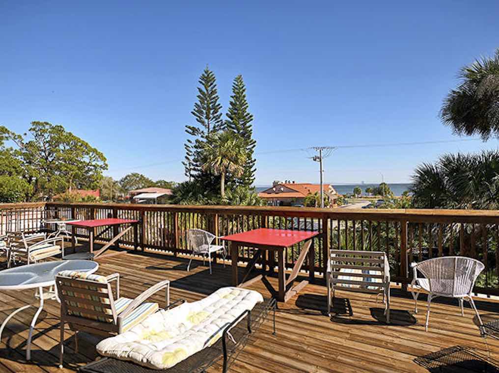 The wooden deck offers front-row seats to nature's daily show &ndash; perfect for morning coffee contemplation or evening wine philosophizing.