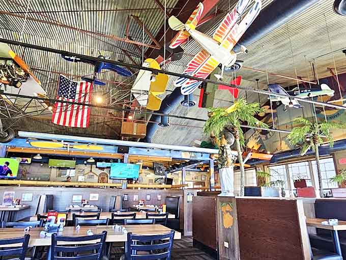 Look up! Model aircraft perform a perpetual airshow above diners, turning a meal into an experience that's equal parts museum and restaurant.