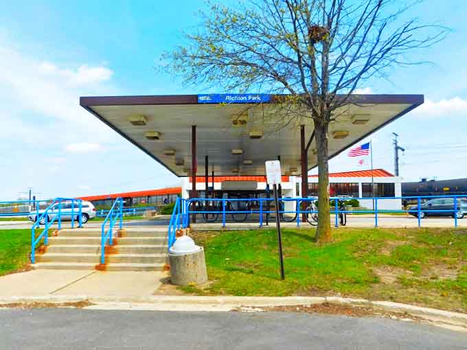 The Metra station's blue canopy welcomes commuters and day-trippers alike, a gateway between hectic city life and the town's gentler rhythm.