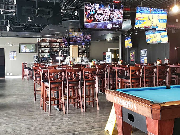 Multiple TVs, warm lighting, and comfortable seating create the perfect backdrop for your bacon adventure &ndash; sports bar meets pork sanctuary.