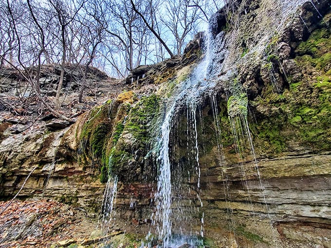 Water cascades over ancient limestone in a graceful dance, creating nature's own symphony in the heart of Saint Paul.