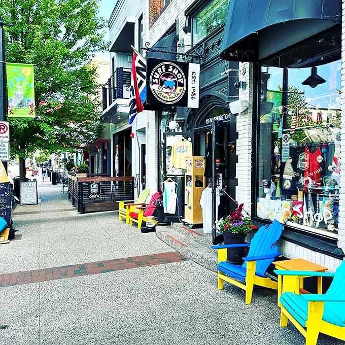 Colorful Adirondack chairs beckon outside local shops, because even the furniture here knows how to have a good time.