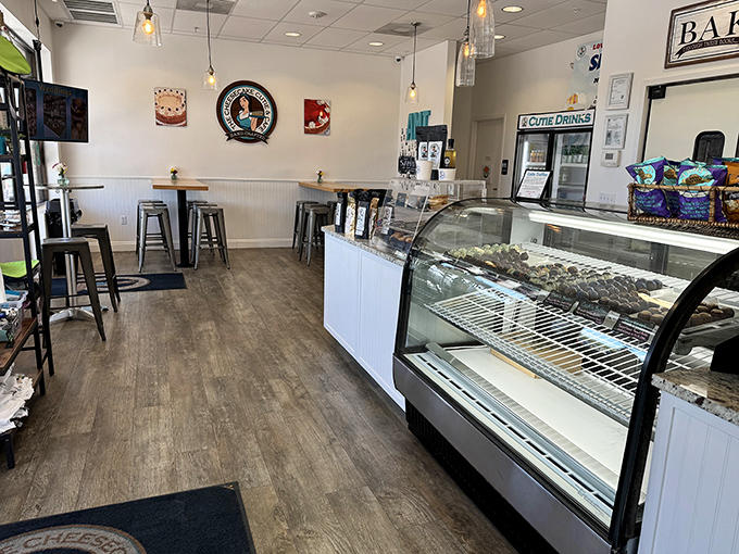 Clean lines, wooden floors, and a display case that might as well have a spotlight from heaven &ndash; this interior says "stay awhile" without saying a word.