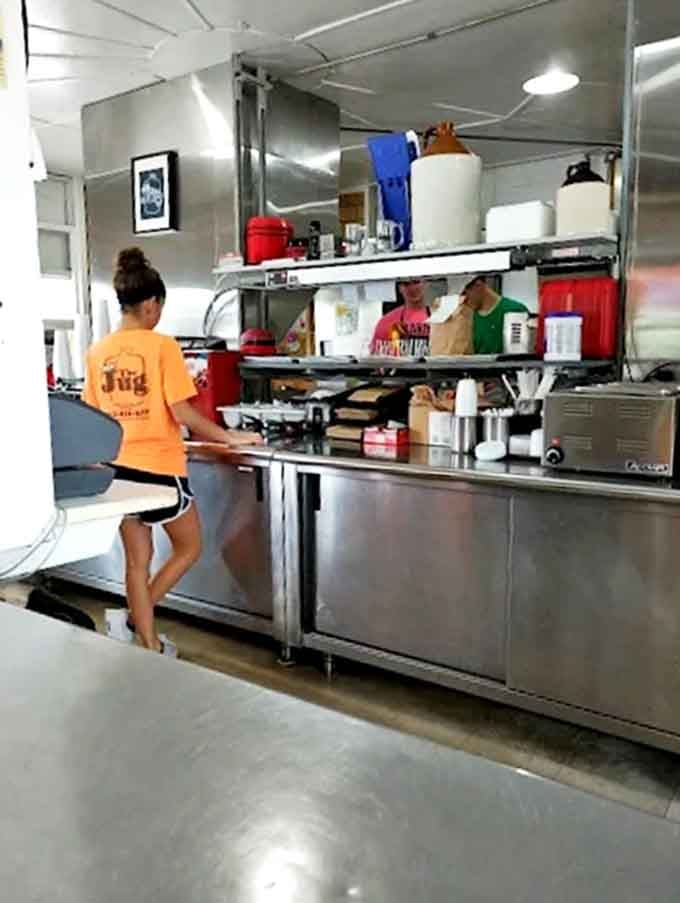 Behind the counter, culinary magic happens with practiced efficiency &ndash; where simple ingredients transform into memorable meals that keep locals coming back.