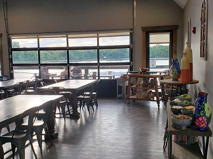 Floor-to-ceiling windows frame the lake like nature's own television, except this show never gets canceled and there are no commercials.